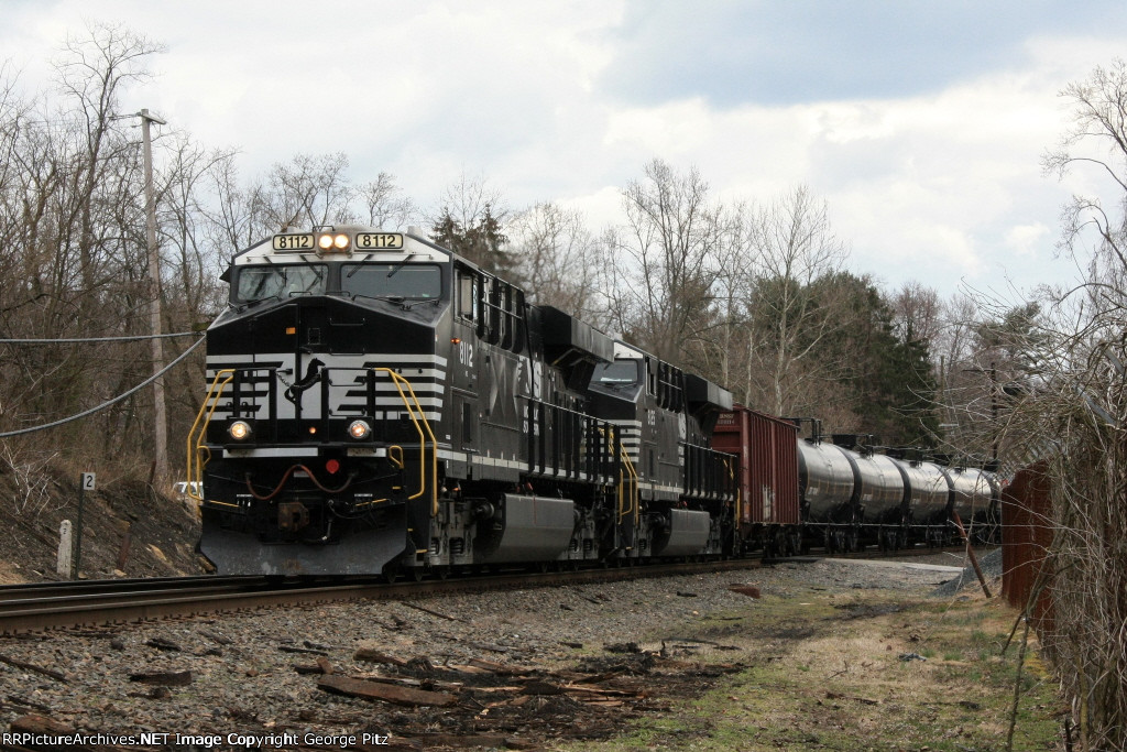 NS 8112 and empty oil train 65R